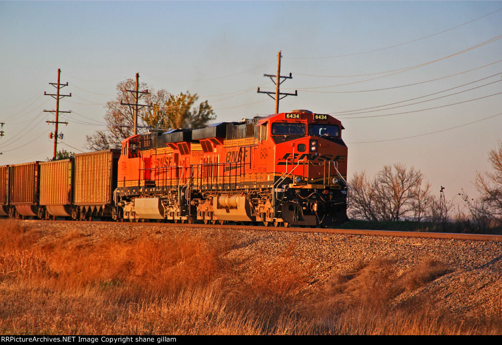 BNSF 6434 Heads Sb on a coal load With a good friend at the controls.
